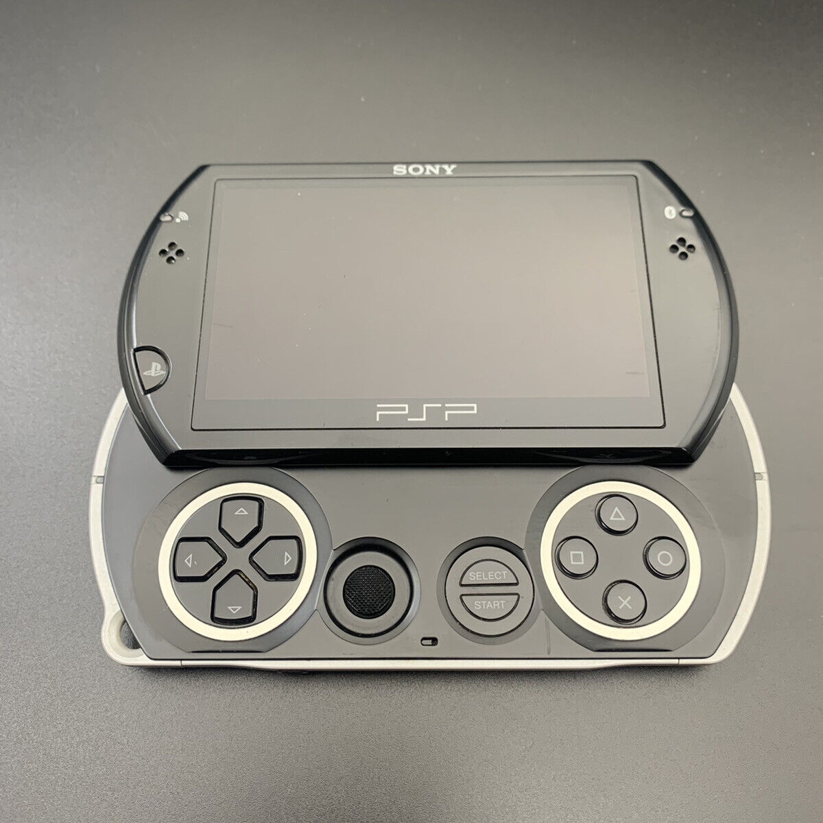 PSP GO Sony PlayStation Portable Go Piano Black Pearl White Console only Used